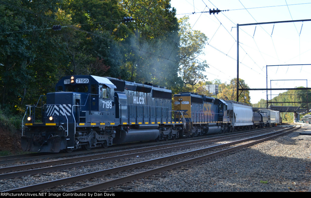 HLCX SD40-2 7199 moving east on Q300-16